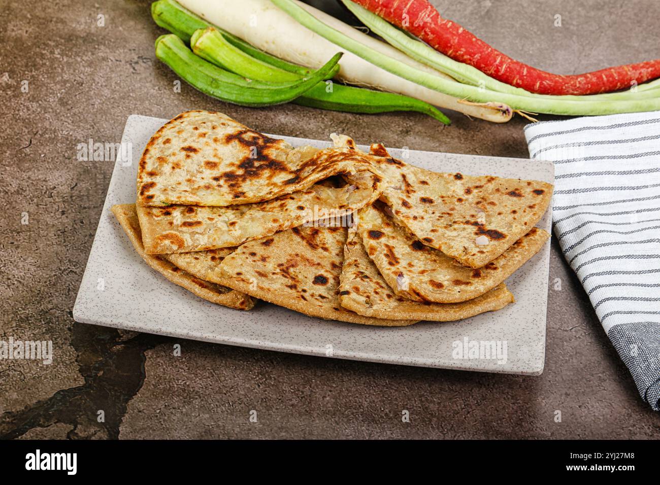 Indian vegetarian Aloo Paratha - bread with potato Stock Photo - Alamy