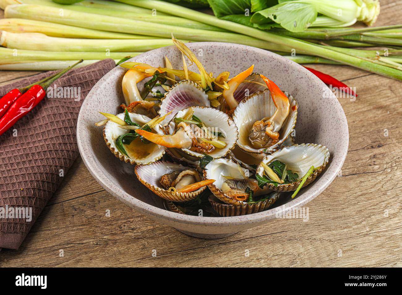 Delicous Asian mollusk shell steamed with spices Stock Photo - Alamy
