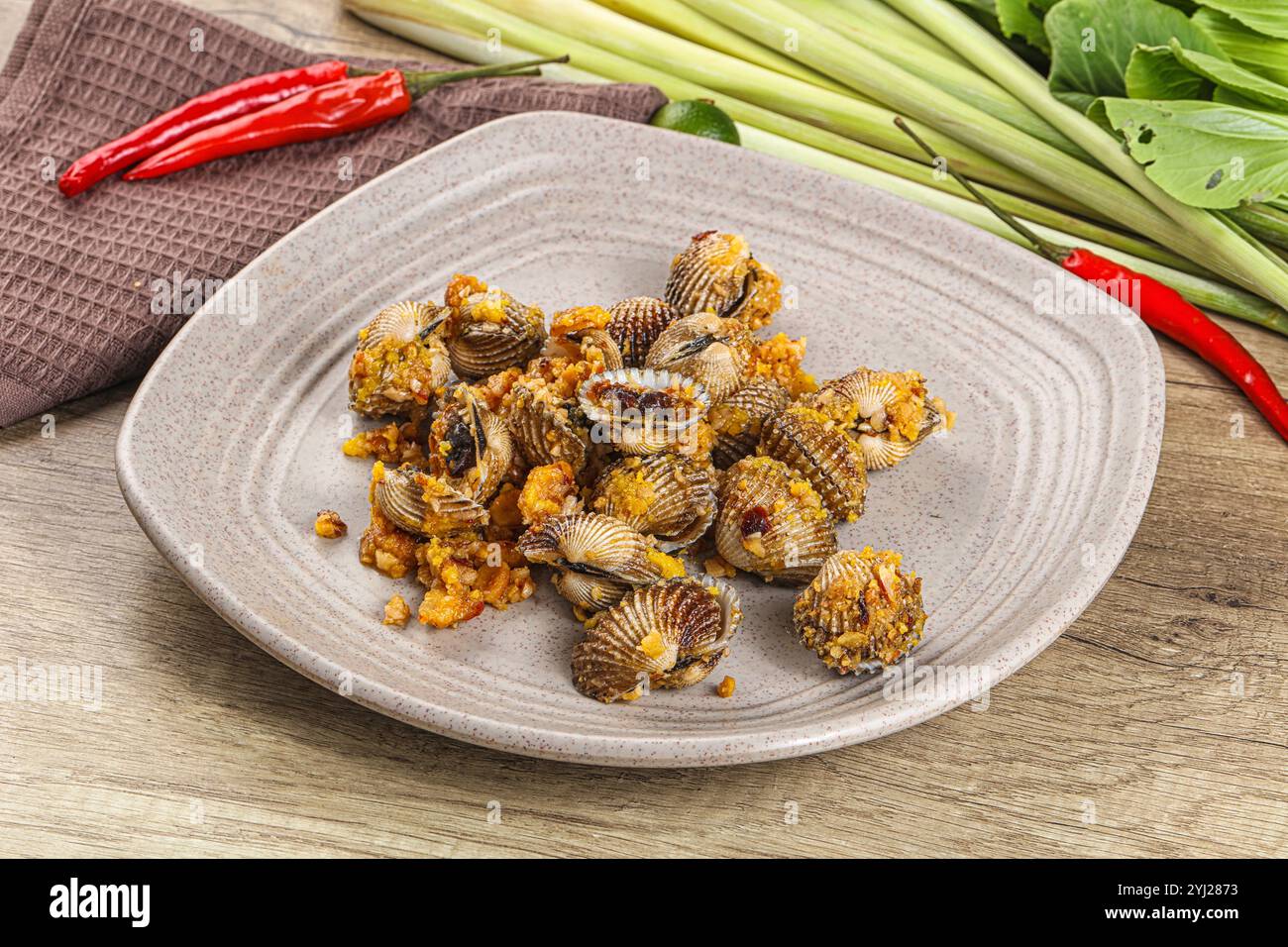 Blood Cockle Fried With Garlic and spices Stock Photo - Alamy