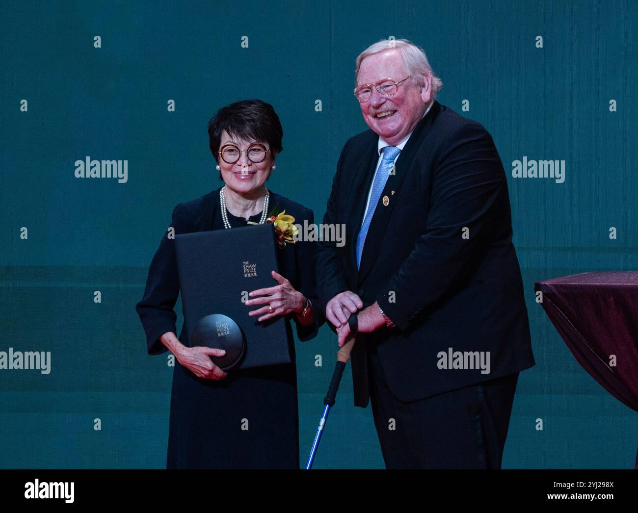 Dr Swee Lay Thein (left) receives the certificate and medal. Hong Kong ...