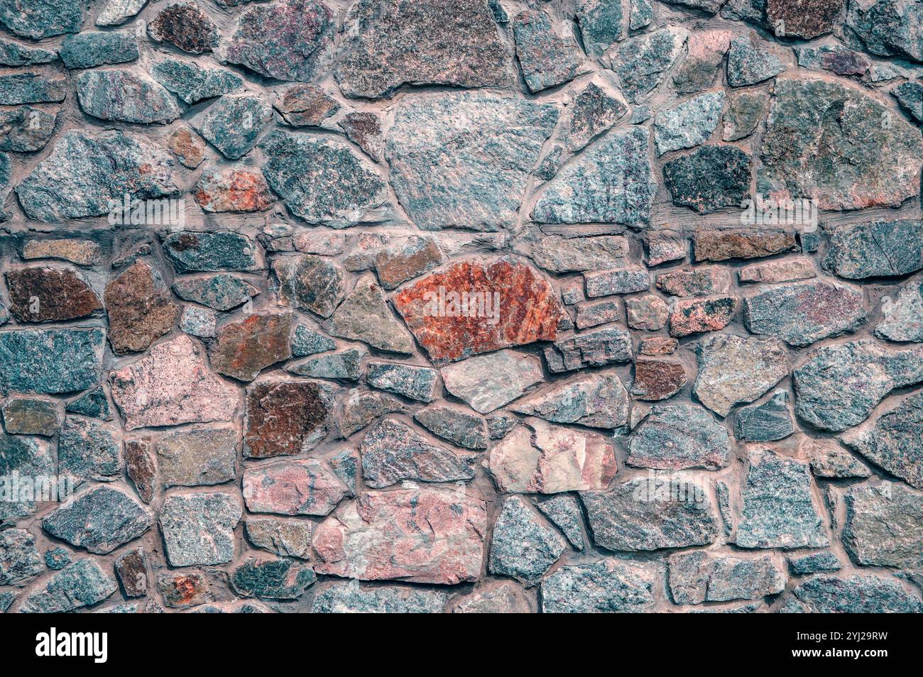 A stone fence wall texture . Whether used for landscaping or ...