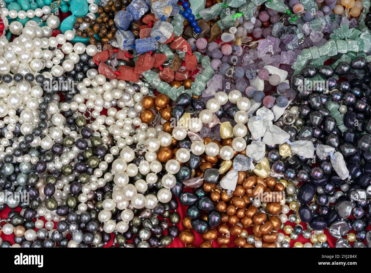 Beads and necklaces made of natural pearls and mother-of-pearl Stock ...
