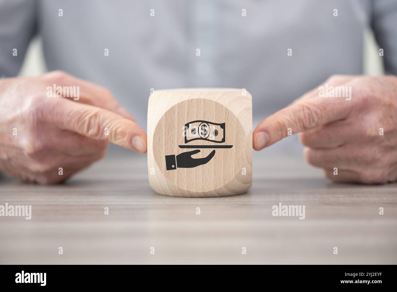 Wooden block with symbol of personal loan concept Stock Photo - Alamy