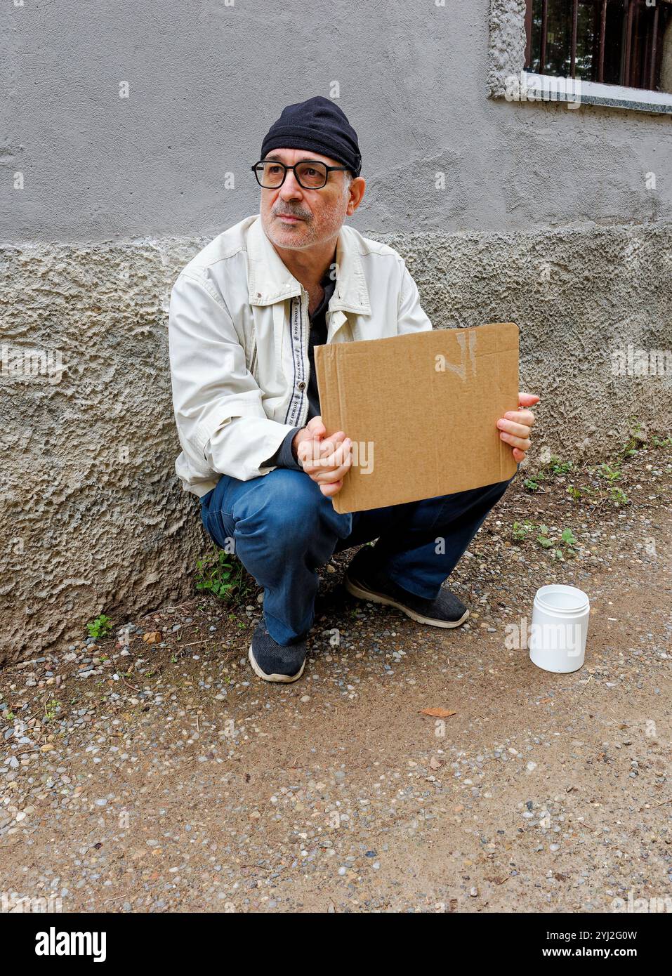 Serious poor man wearing hi-res stock photography and images - Alamy