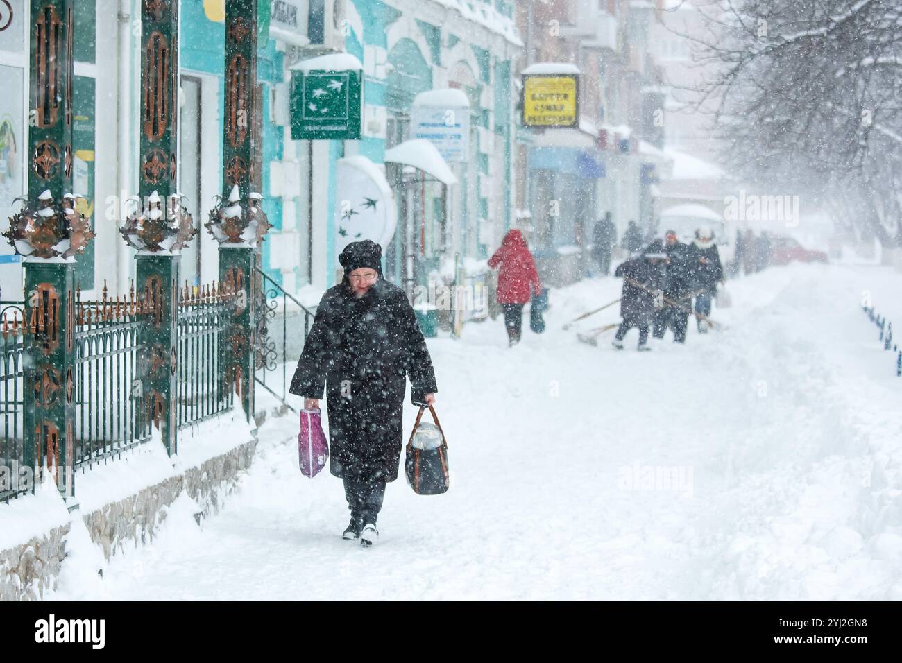 Grandmother in blizzard hi-res stock photography and images - Alamy