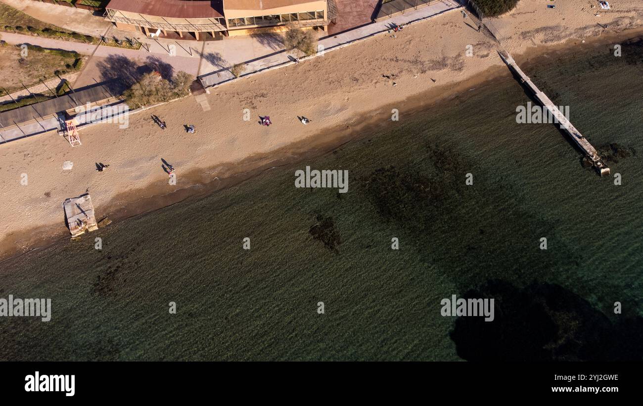 Seascape of a beach where people are relaxing on the outskirts of the ...