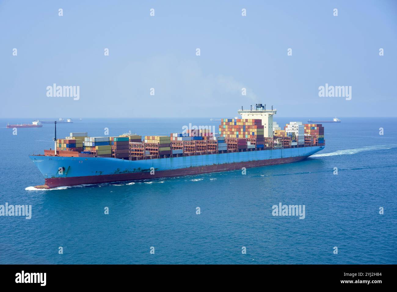Cargo ship sails across ocean hi-res stock photography and images - Alamy