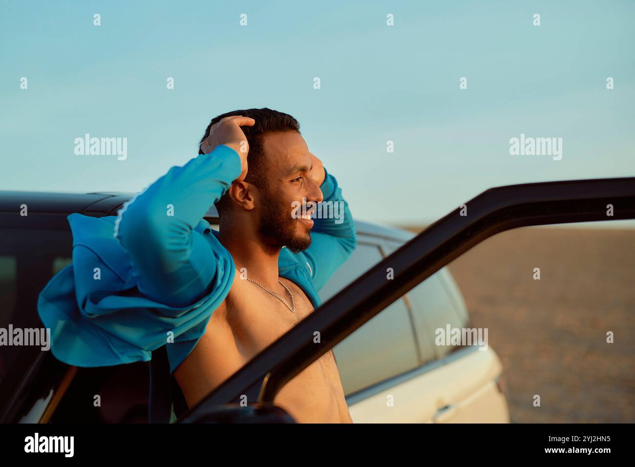 Man leaning out of car window hi-res stock photography and images - Alamy