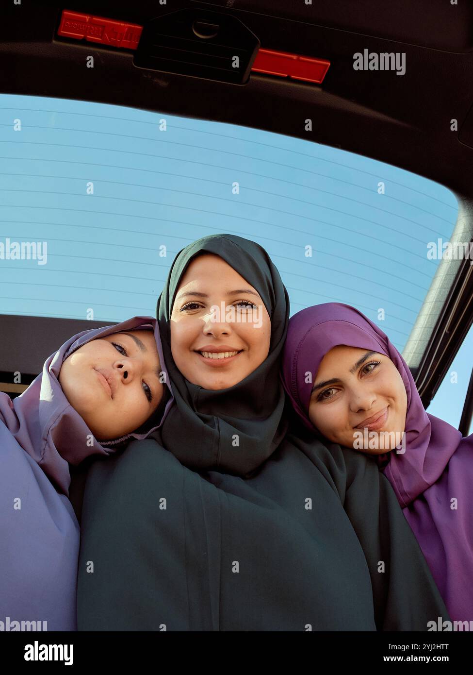 Women pose by car hi-res stock photography and images - Alamy