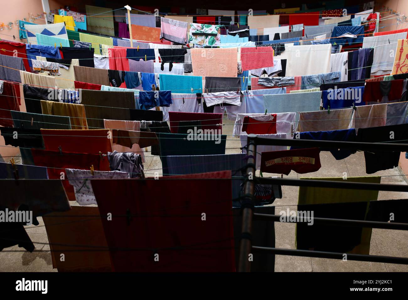 Inmates' laundry is hung out to dry in one of the courtyards at São ...