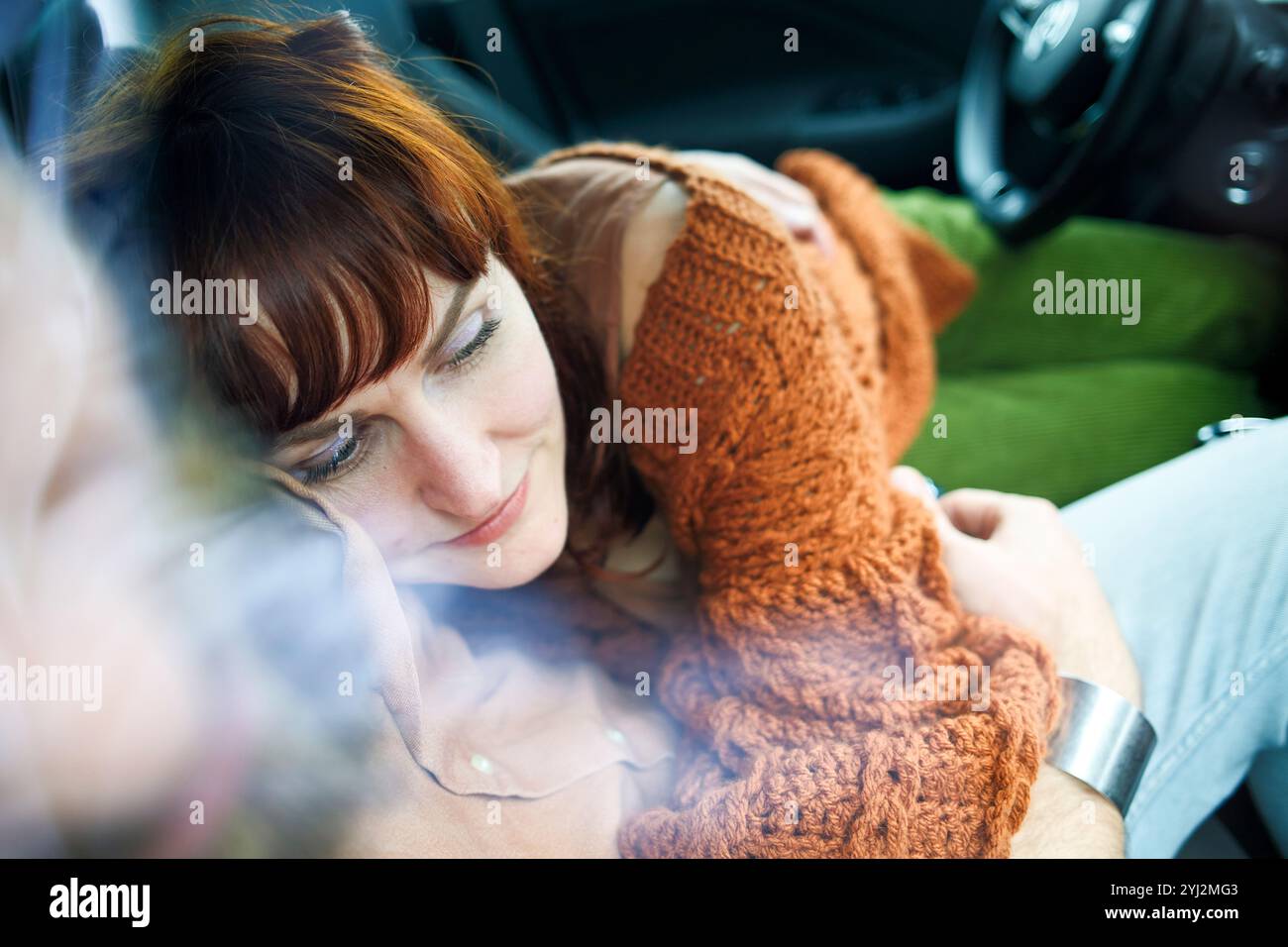 Head on lap hi-res stock photography and images - Alamy