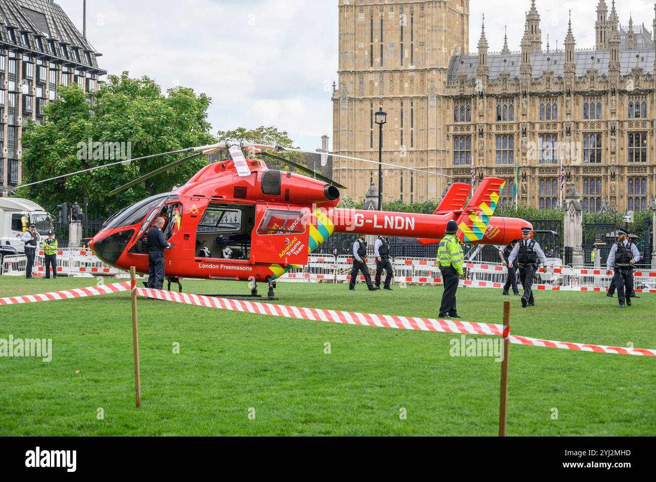 London, UK. Air Ambulance joining Emergency services in Parliament ...