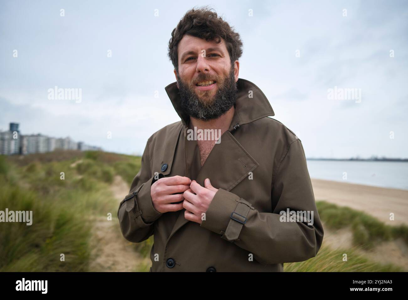 Buttoning up coat hi-res stock photography and images - Alamy