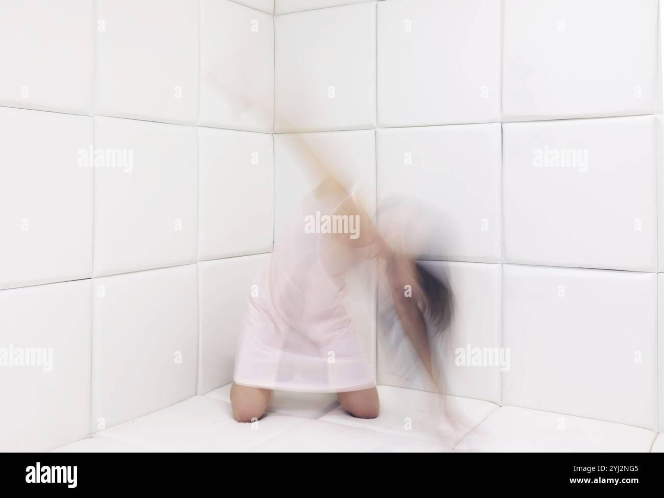Blur motion photo of a young woman flouncing in a mental hospital ...