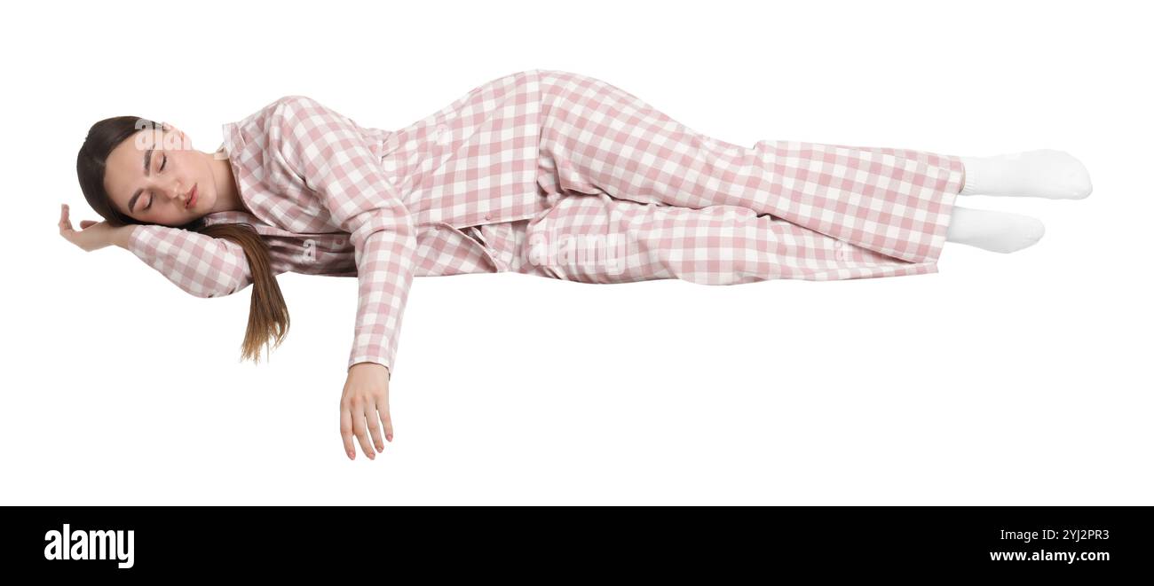 Young woman suffering from sleepwalking on chair against white ...