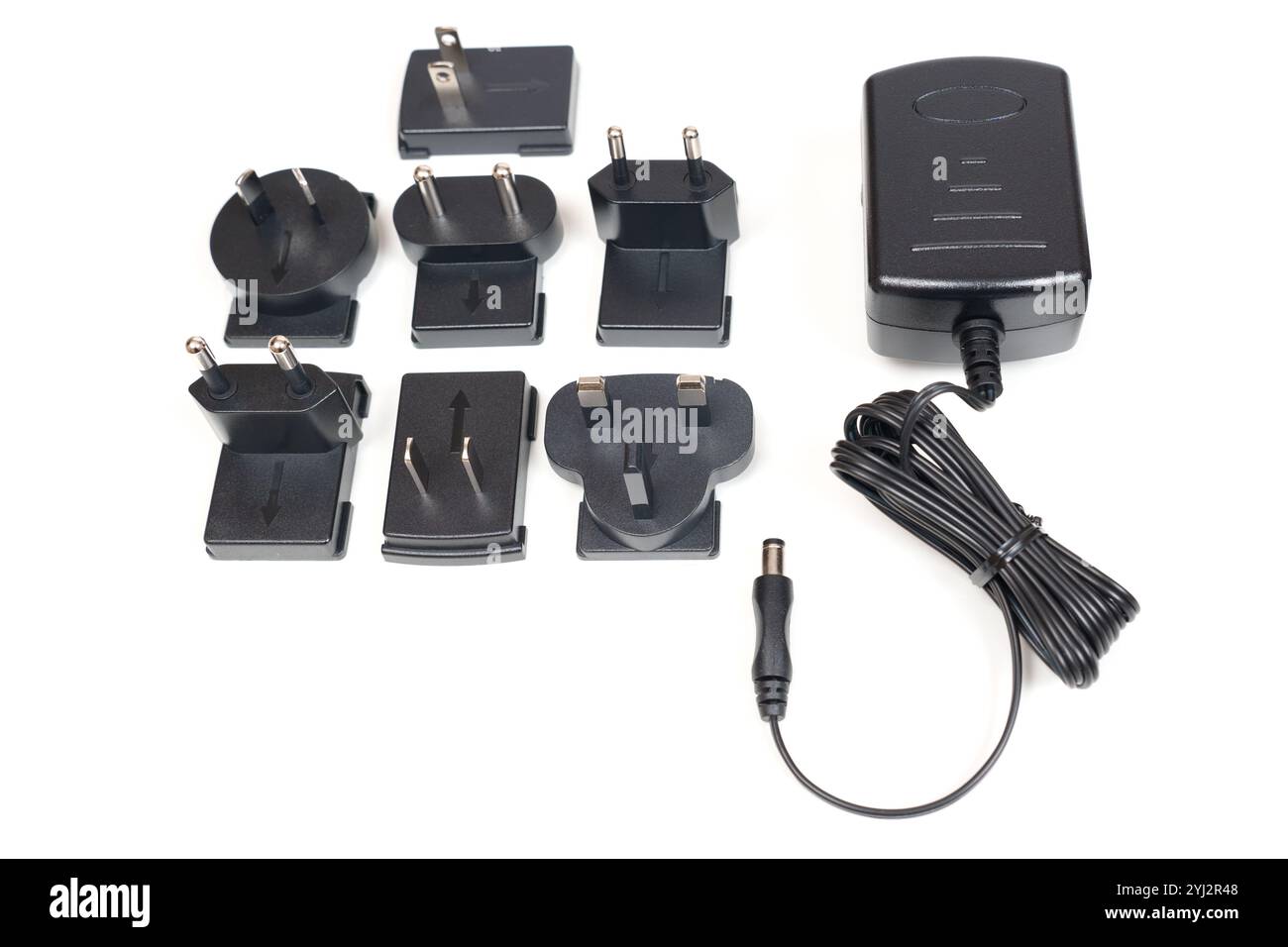 Power adapter showcased with various interchangeable plug types ...