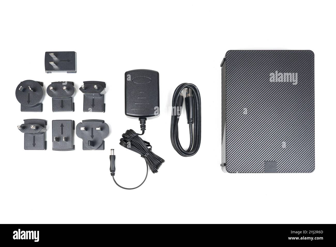 Top view of an external hard disk drive with power adapter and multiple ...