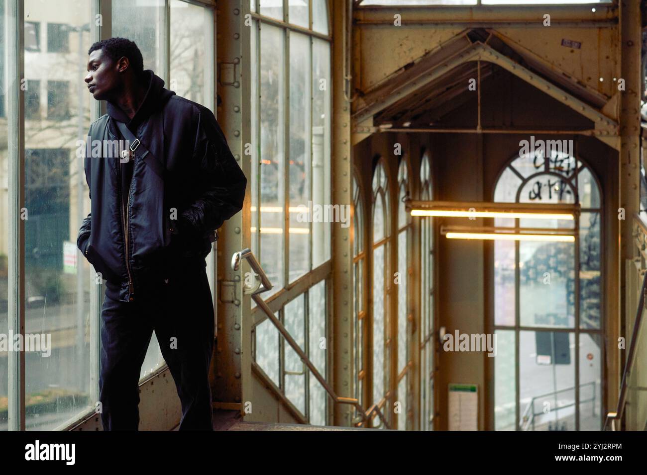 Leaning steel beam clock train tracks visible hi-res stock photography ...