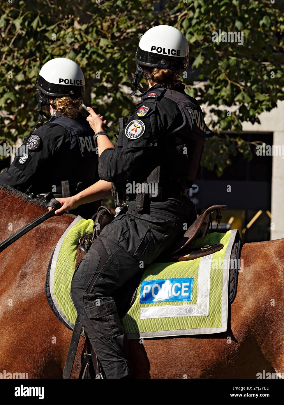 Toronto Canada / Mounted Policewomen photograph watering their horses ...