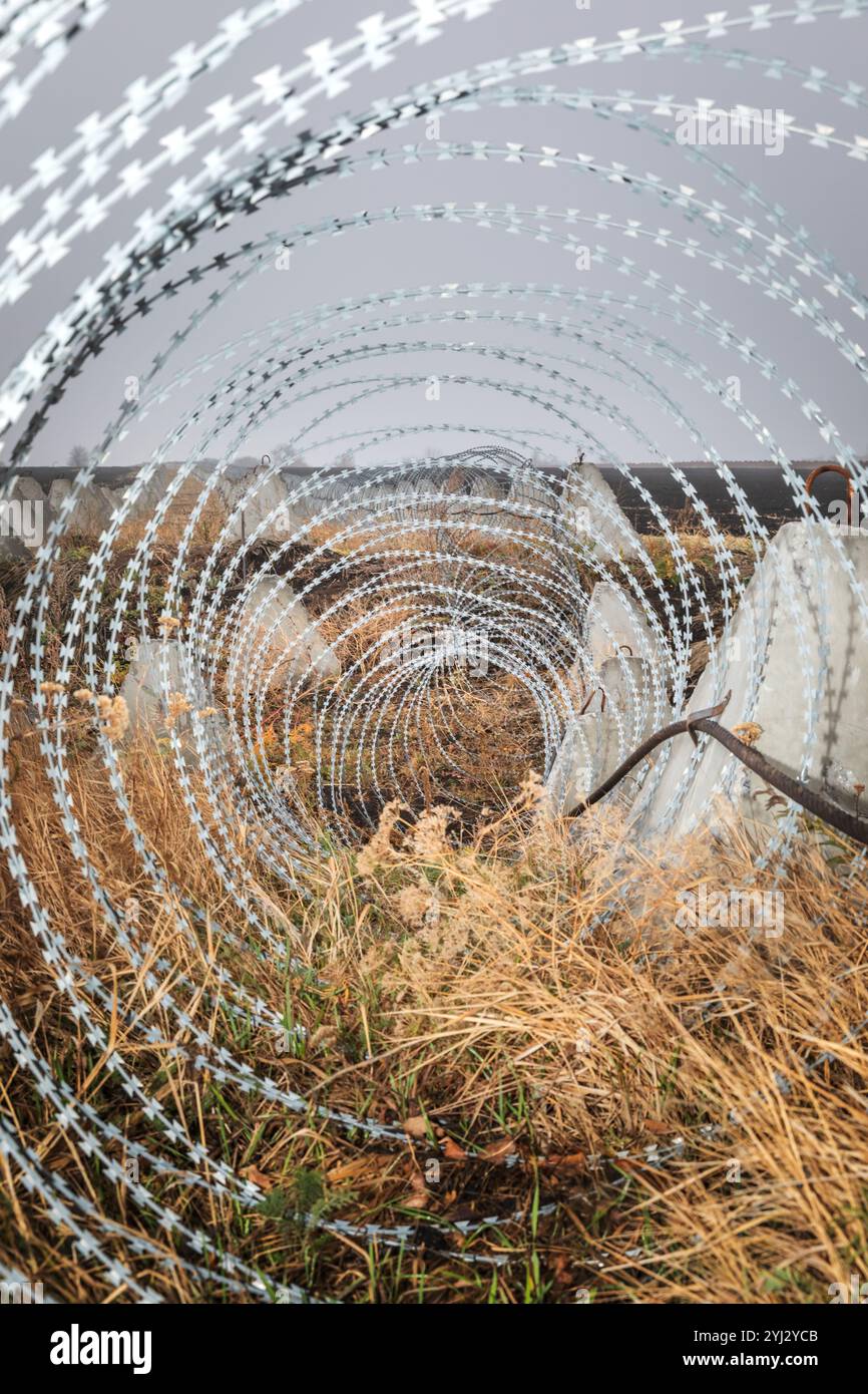 Dragon's teeth fortifications and barbed wire in Kharkiv region ...