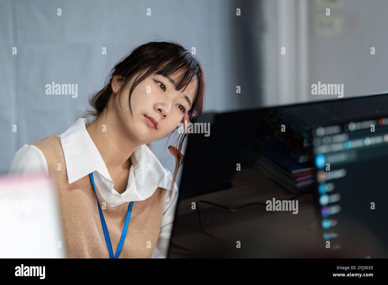 Stressed Office Worker Experiencing Office Syndrome at Desk in Modern ...