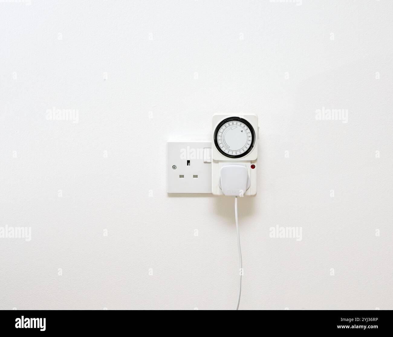 Mechanical plugin mini timer swich plugged into a 13amp wall socket ... Mechanical plugin mini timer swich plugged into a 13amp wall socket ...