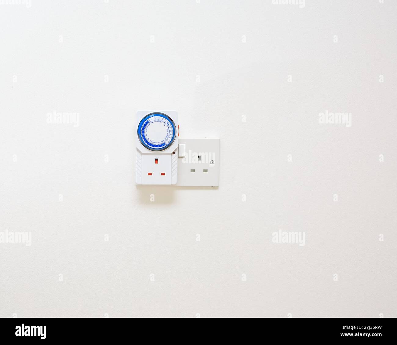 Mechanical plugin mini timer swich plugged into a 13amp wall socket ... Mechanical plugin mini timer swich plugged into a 13amp wall socket ...