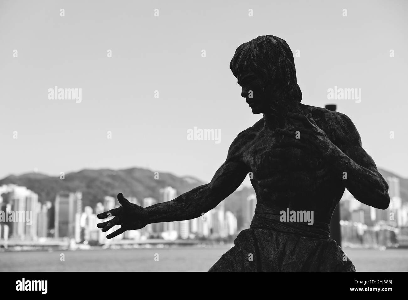 The iconic Bruce Lee statue stands on the waterfront, capturing the ...