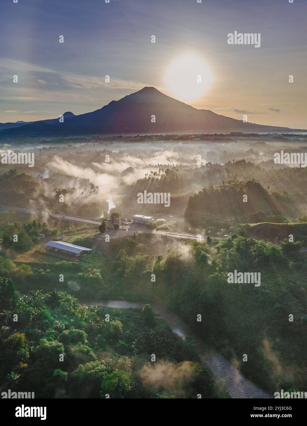 Morning View with Mountain Background and Ray of Light Stock Photo - Alamy