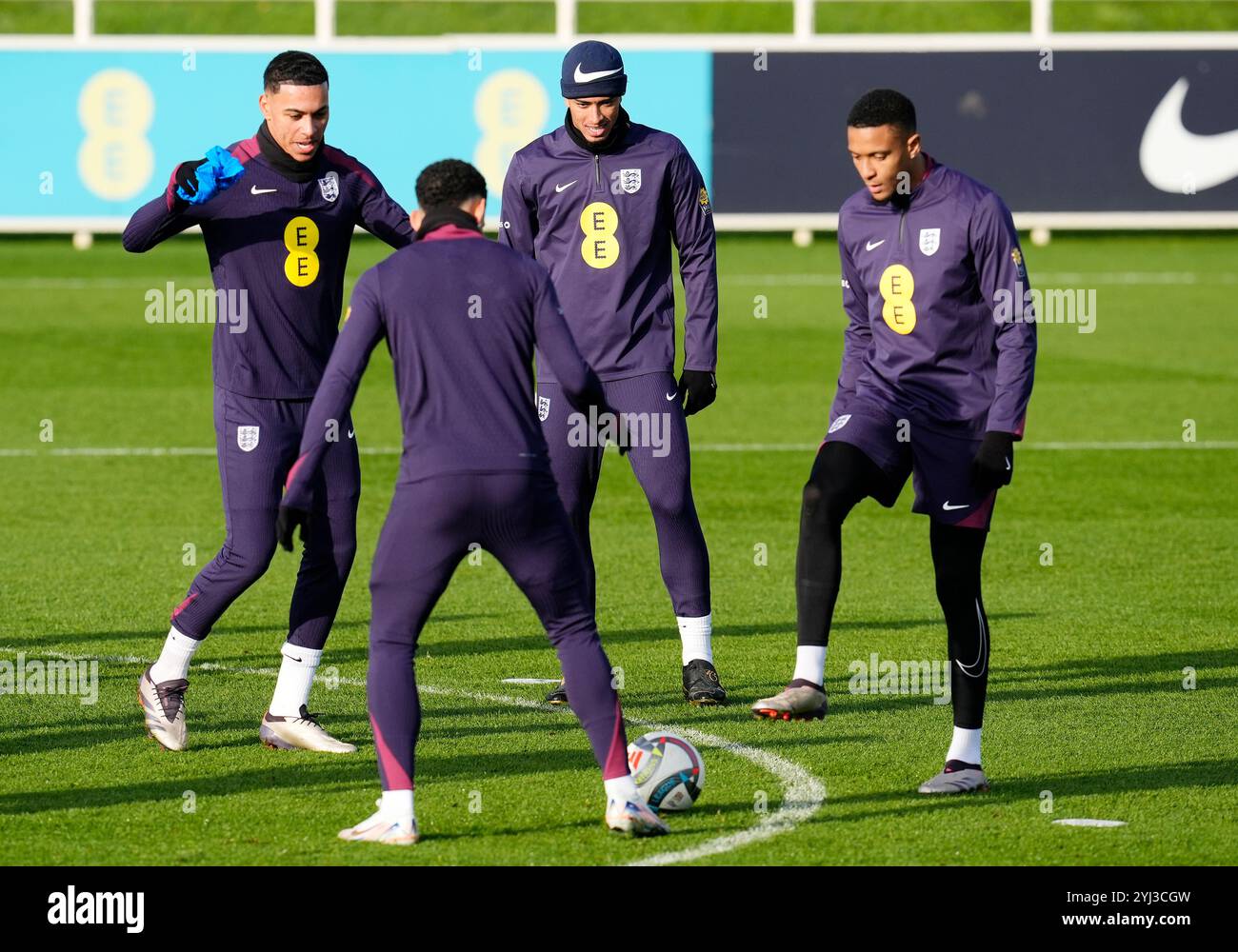 England's Morgan Rogers (left), Jude Bellingham (centre) and Ezri Konsa ...