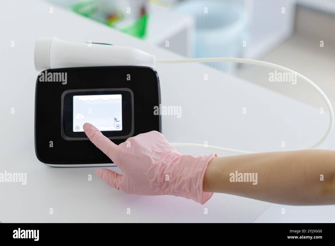 Doctor during a spirography test, measuring breathing movements with ...