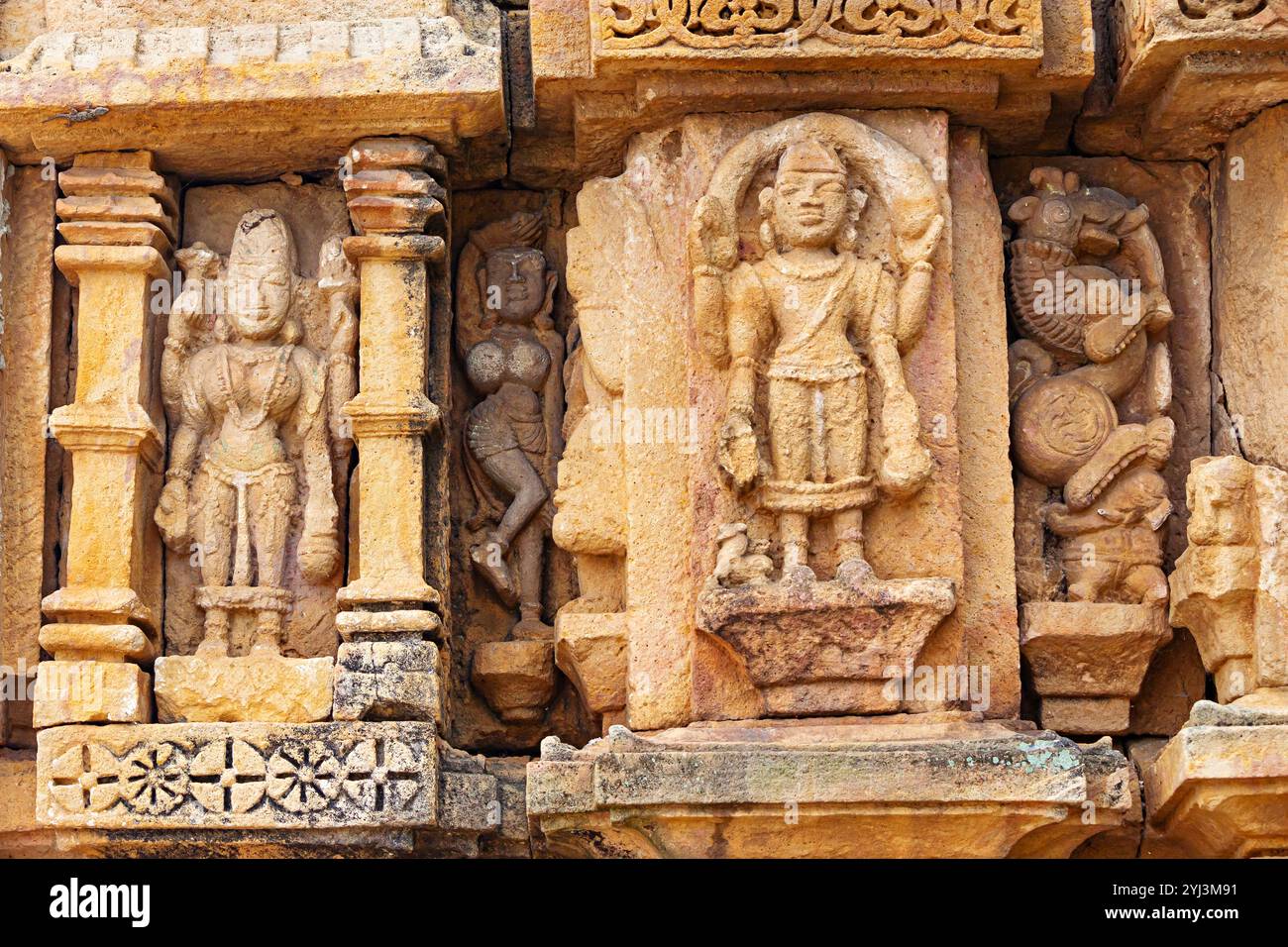 Carved sculptures of Hindu deities on the Vishwanatha Shiv Temple ...