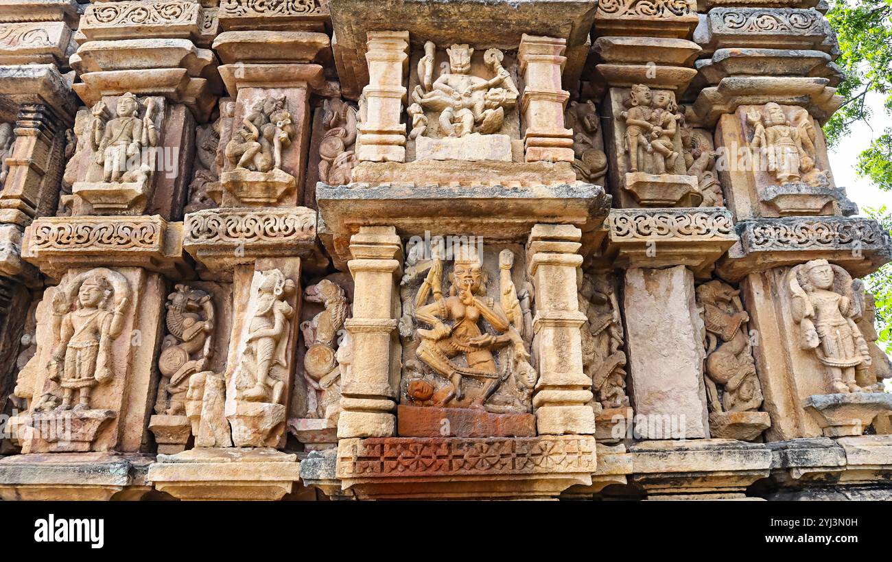 Carved sculptures of Hindu deities and erotic figures on the Vishwanatha Shiv Temple, located in ...