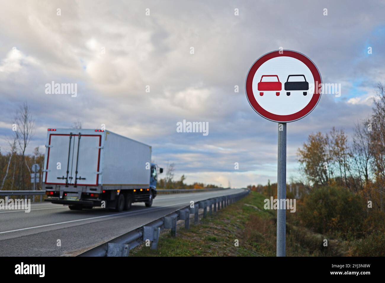 a road sign prohibiting overtaking Stock Photo - Alamy
