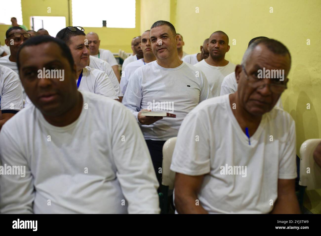 Prisoners listen to book presentations by fellow inmates. A reading ...