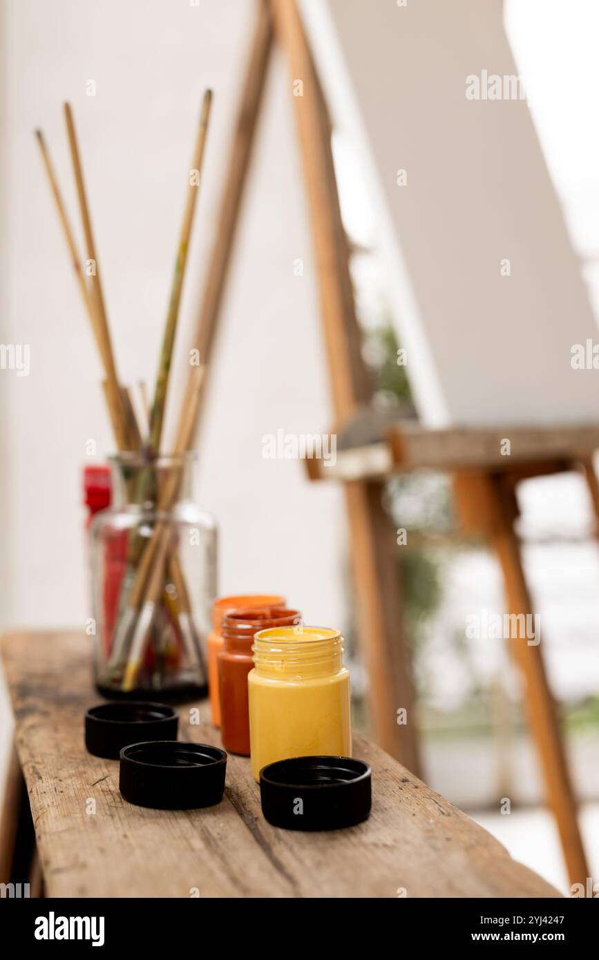Art supplies and easel ready for creative painting session at home ...