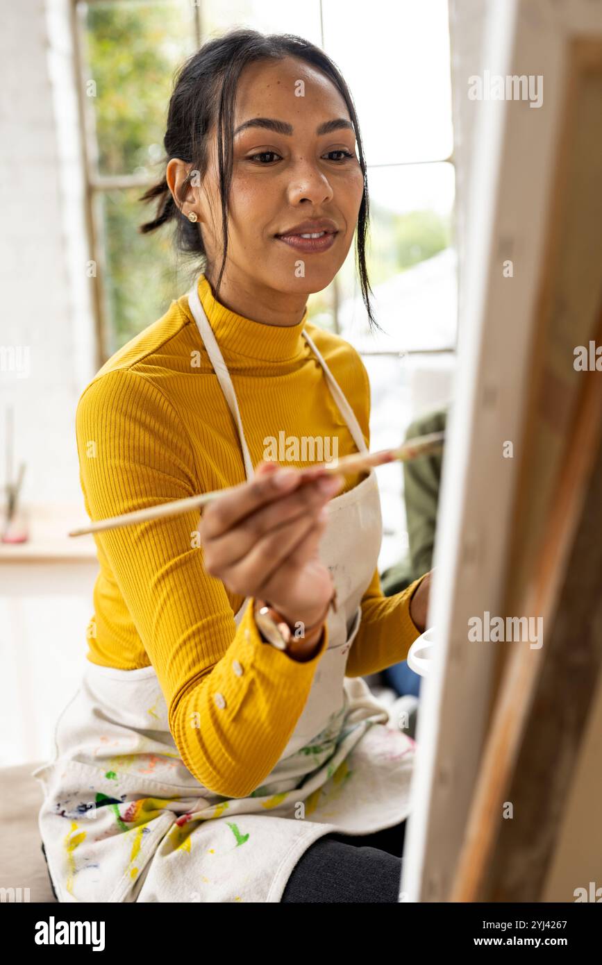 Creative artist wearing apron home hi-res stock photography and images ...