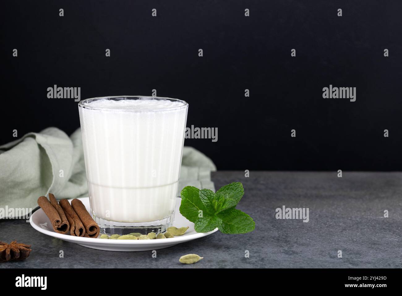 Popular Indian cold drink - Lassi. Yoghurt drink with spices and mint ...