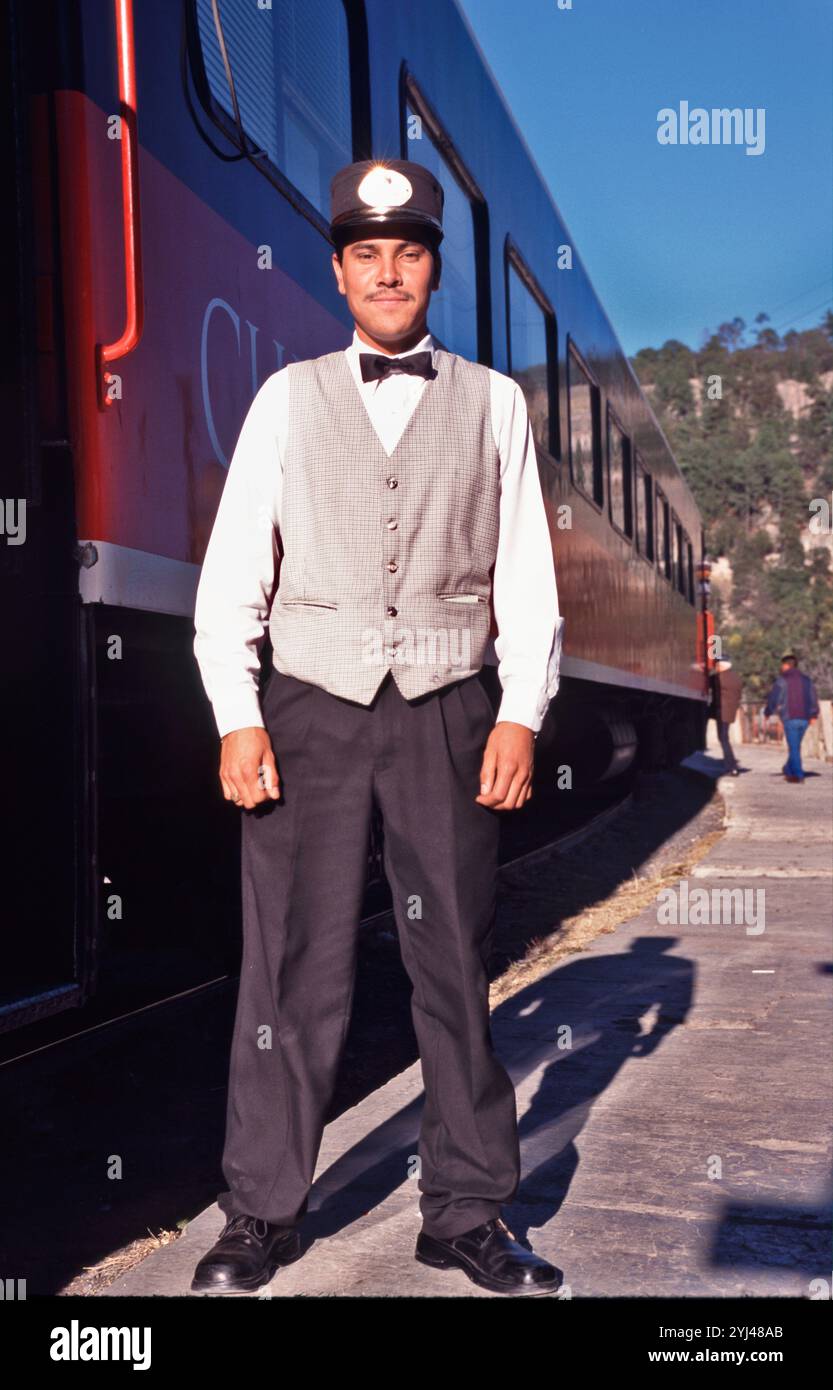 Train conductor at Divisadero station, Copper Canyon Railway, Barranca ...