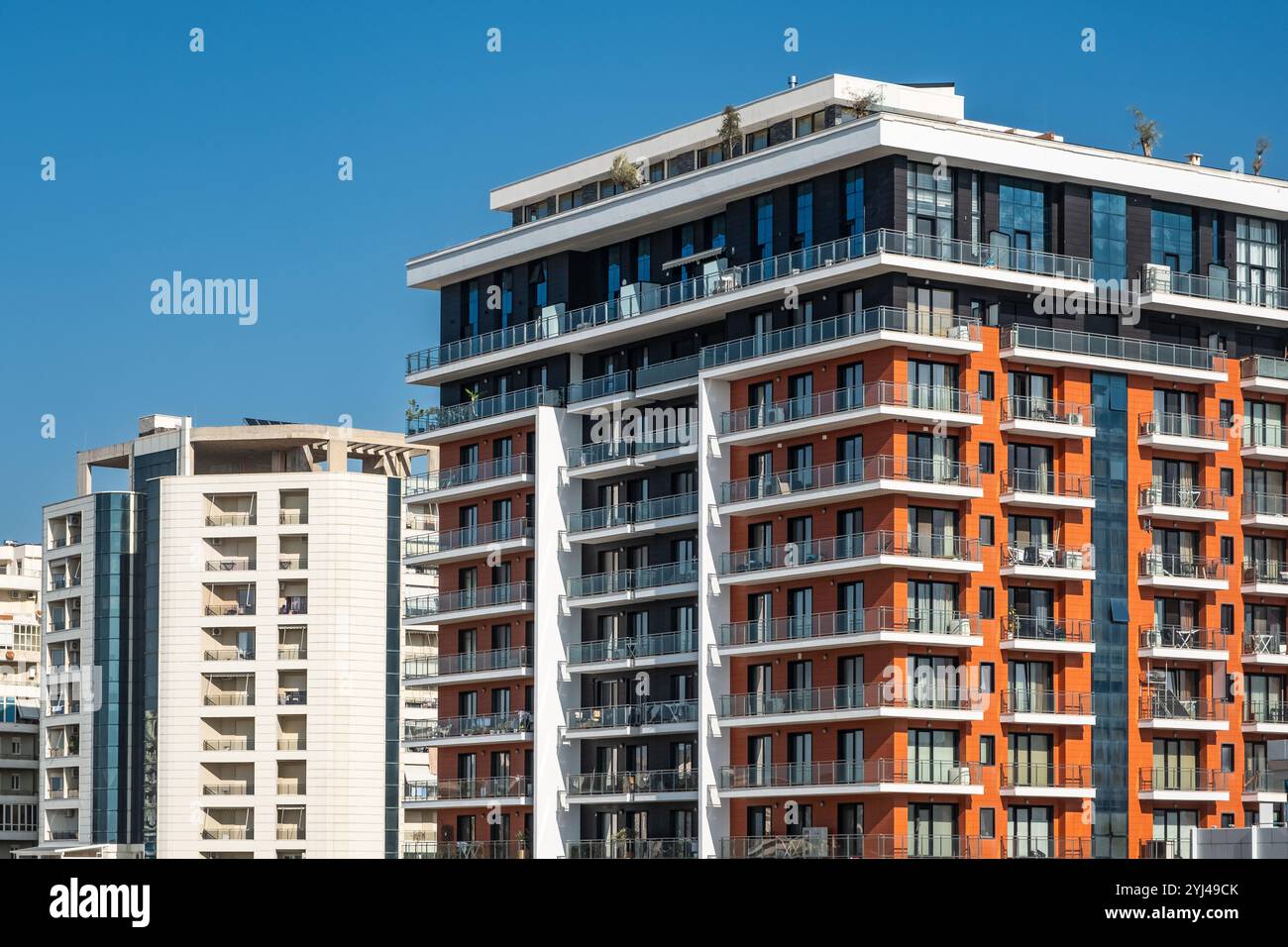 New modern block of flats in a city. Residential apartment with flat ...