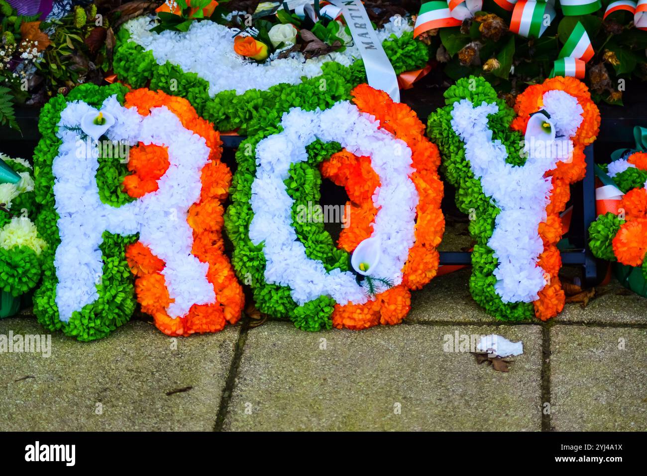 Belfast, United Kingdom 13/11/2024 Tributes left to veteran Falls Road ...