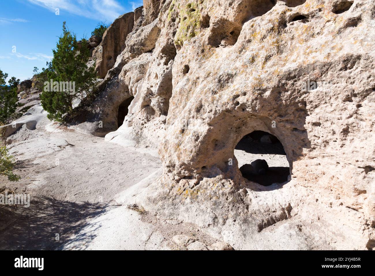 The Tsankawi Ruins Trail leading along a tuff cliff, Bandelier National ...