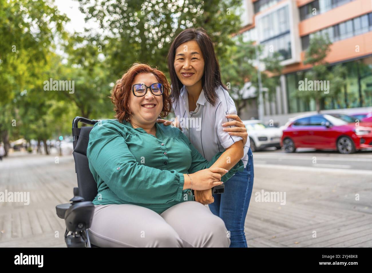 Portrait of a happy caucasian adult woman with disability sitting on ...