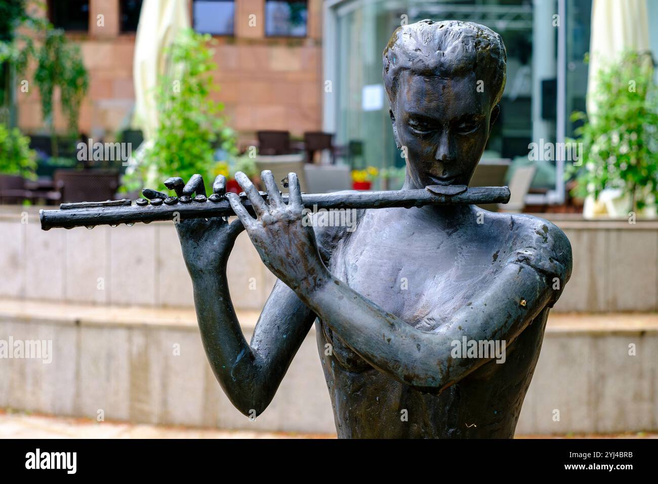 Statue flute player hi-res stock photography and images - Alamy