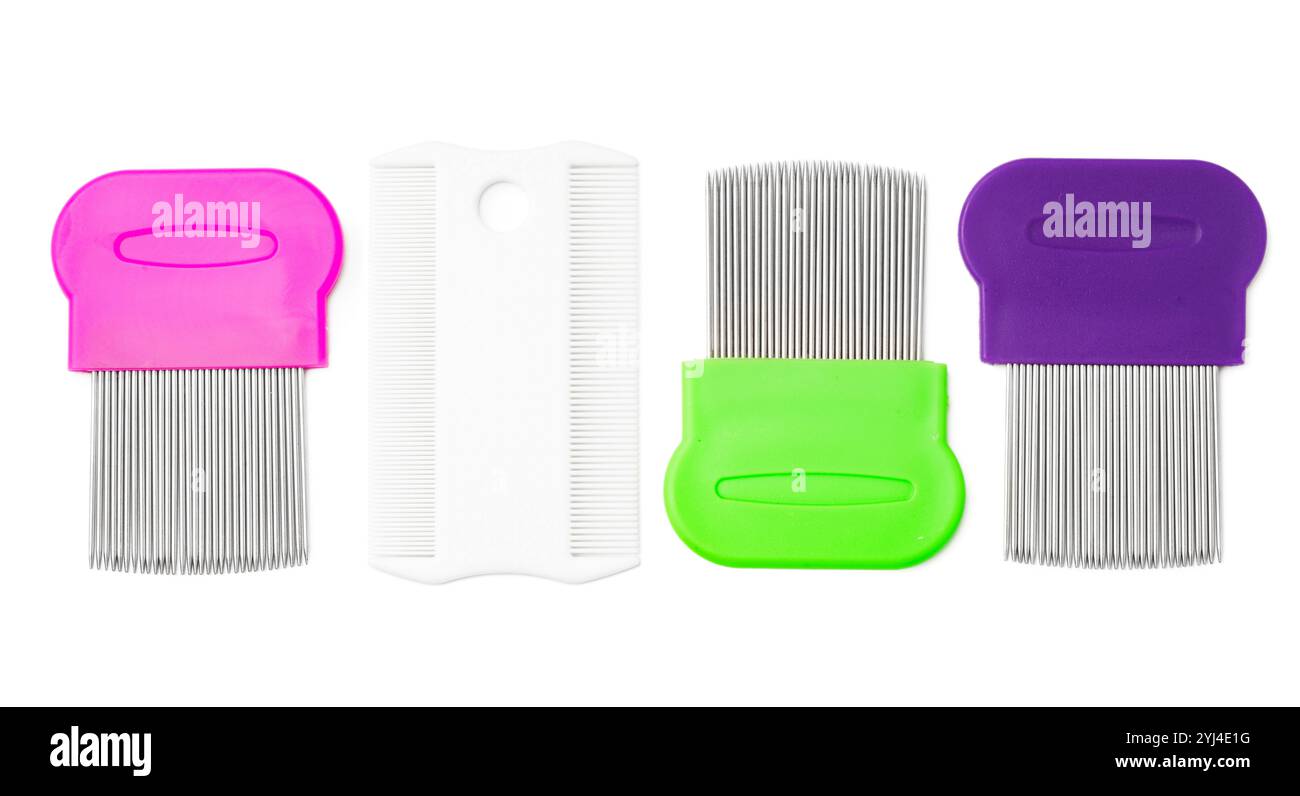 Colorful plastic and metal combs on a white background Stock Photo - Alamy