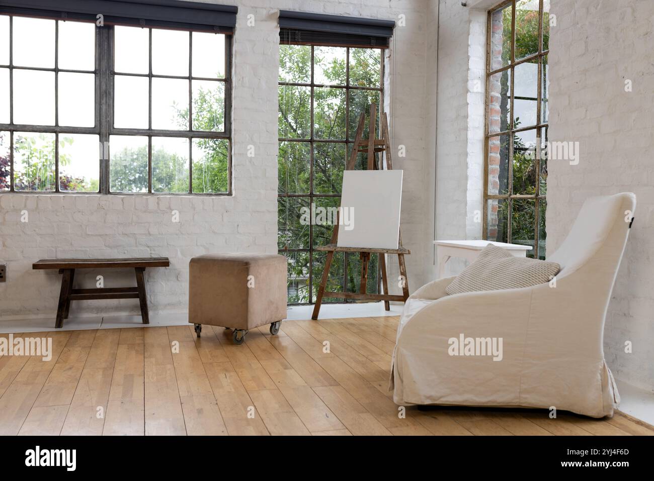 Cozy art studio with blank canvas, inviting creativity and inspiration ...