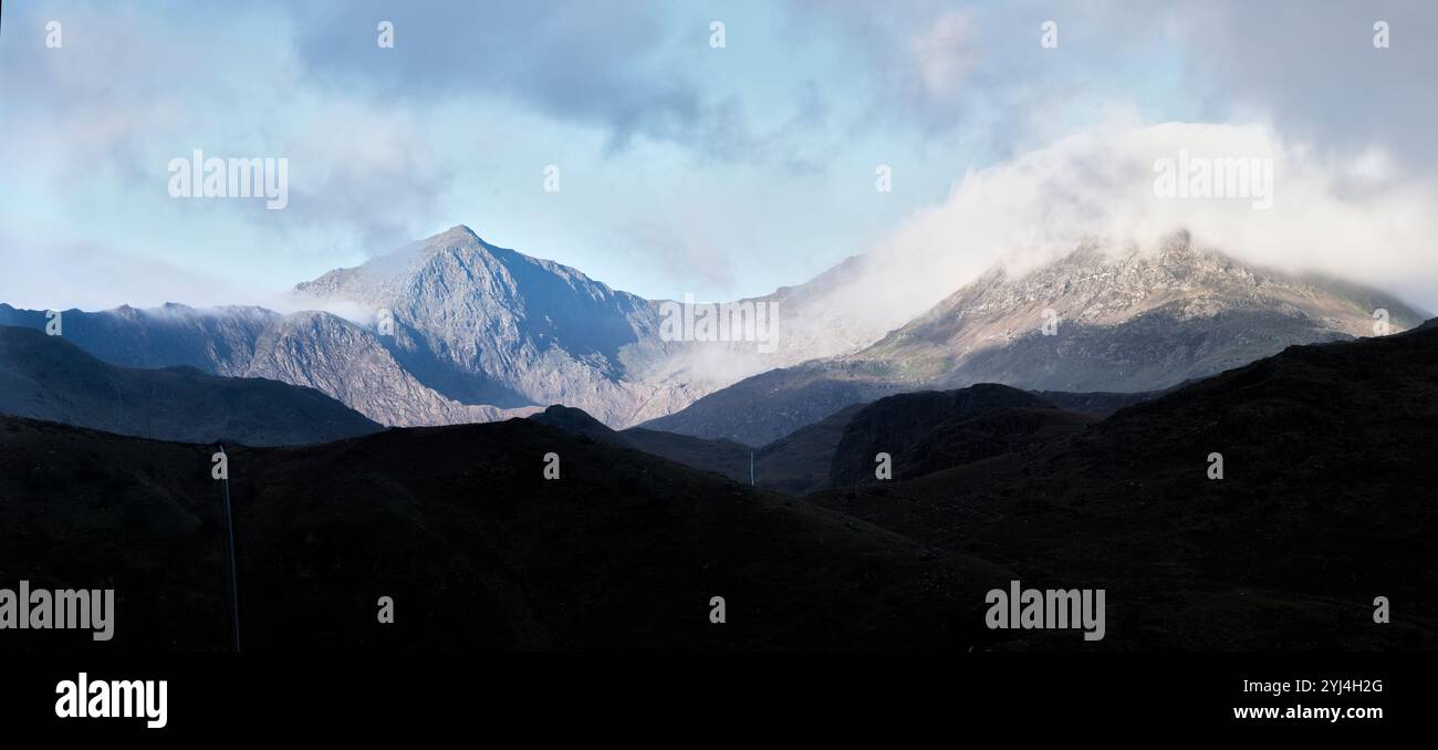 Summits of Yr Wyddfa (Mount Snowdon) and Grib Goch shrouded in cloud ...