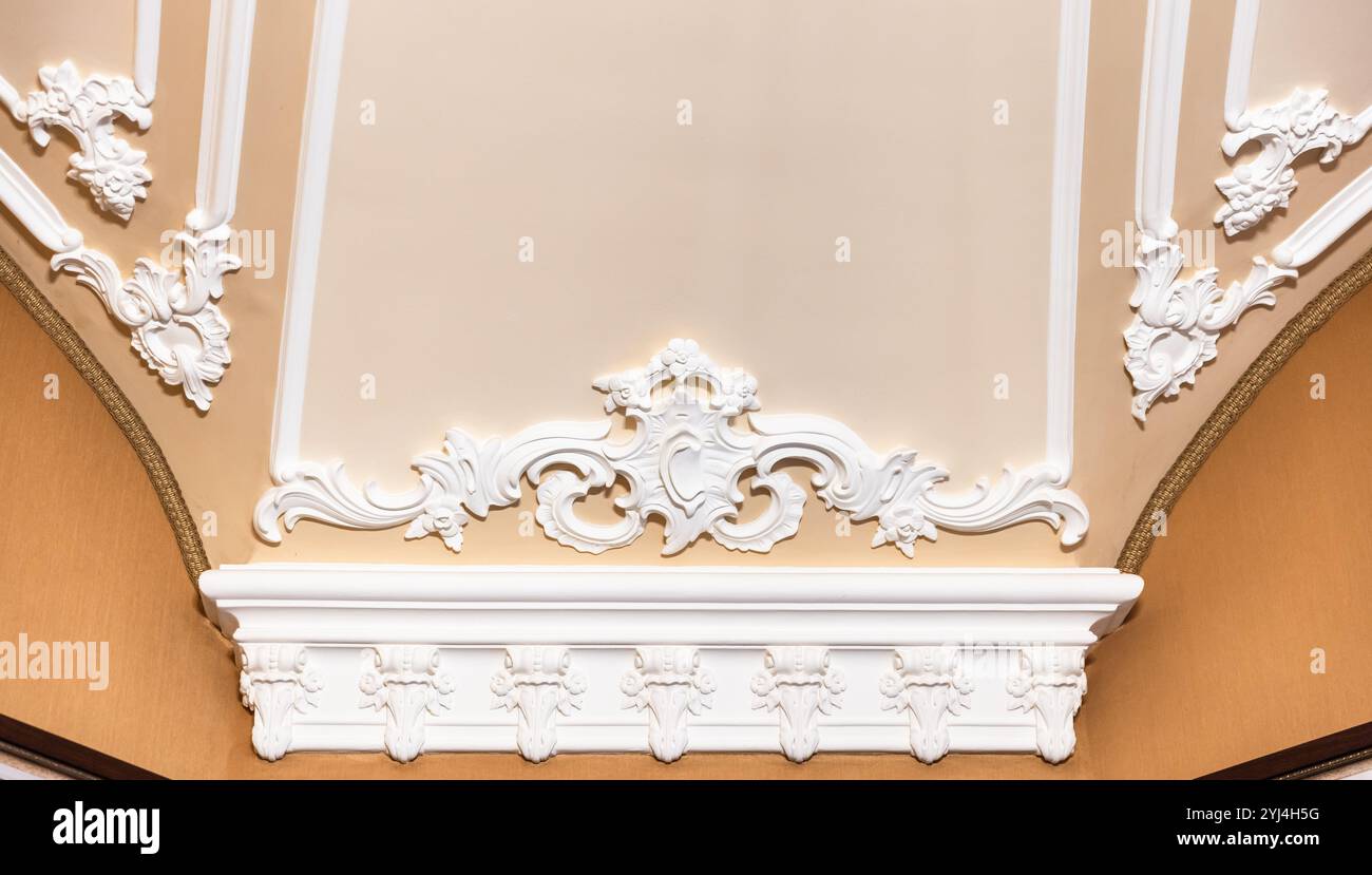 White gypsum bas-relief decoration design details with floral pattern ...