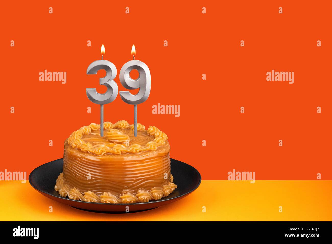 Birthday candle number 39 - Cake with dulce de leche frosting Stock ...