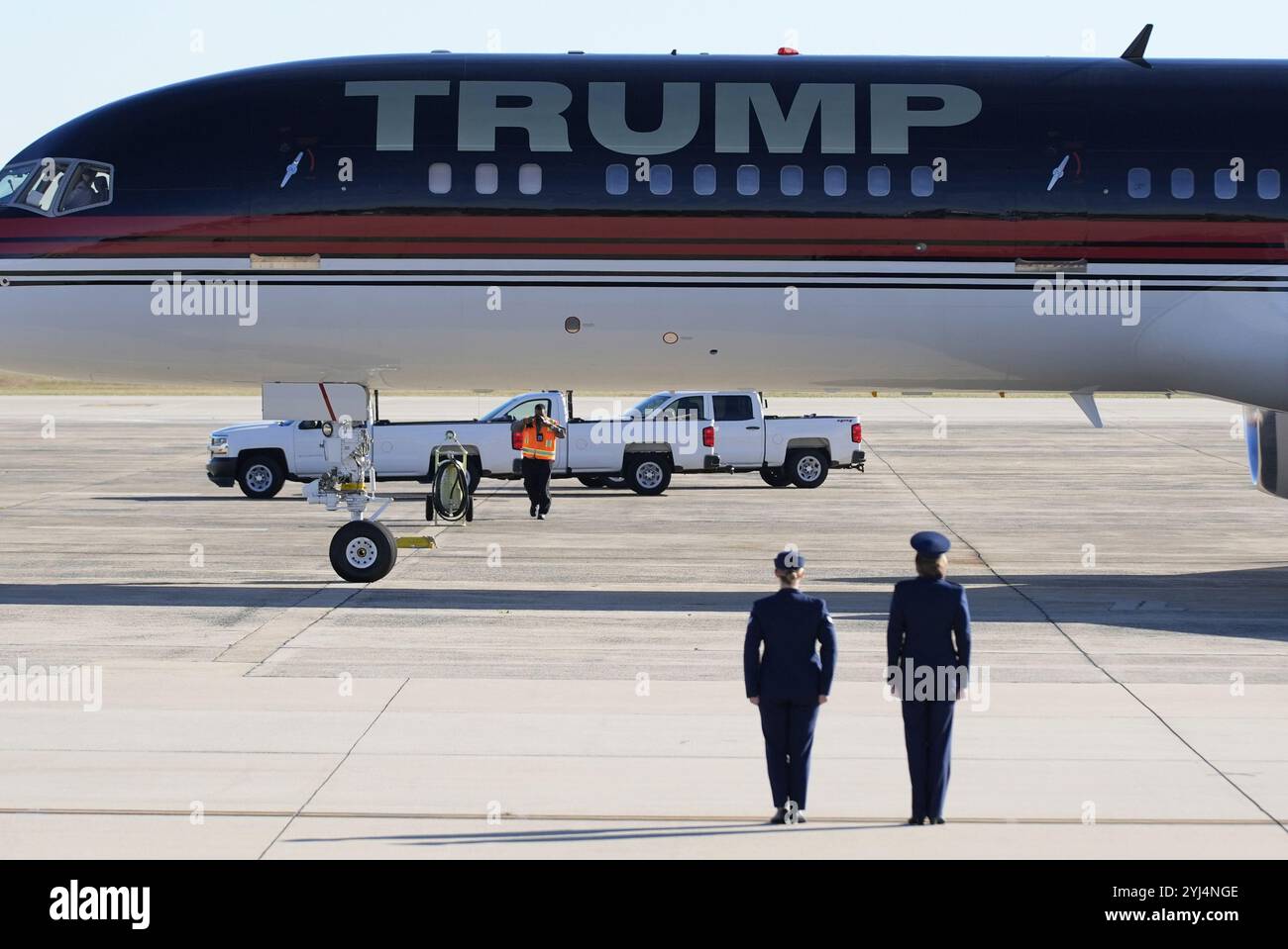 President-elect Donald Trump's airplane, with Trump aboard, arrives ...